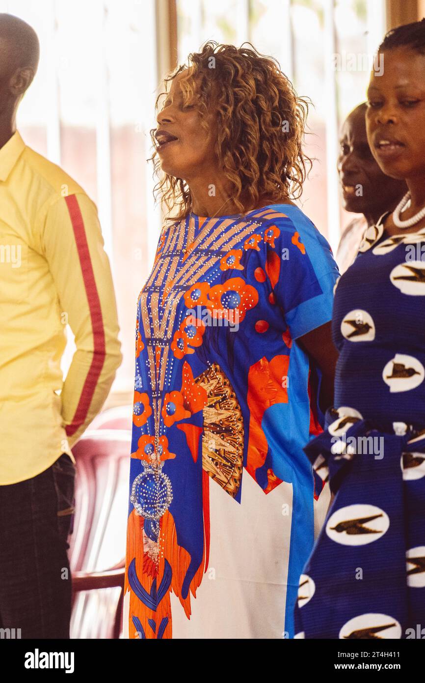 A group of people gathered in a church in Abidjan, Cote d'Ivoire ...