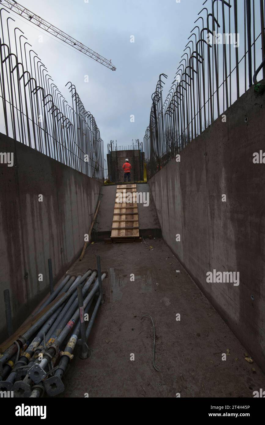 Construction Worker At A Building Site, Employee In Construction ...