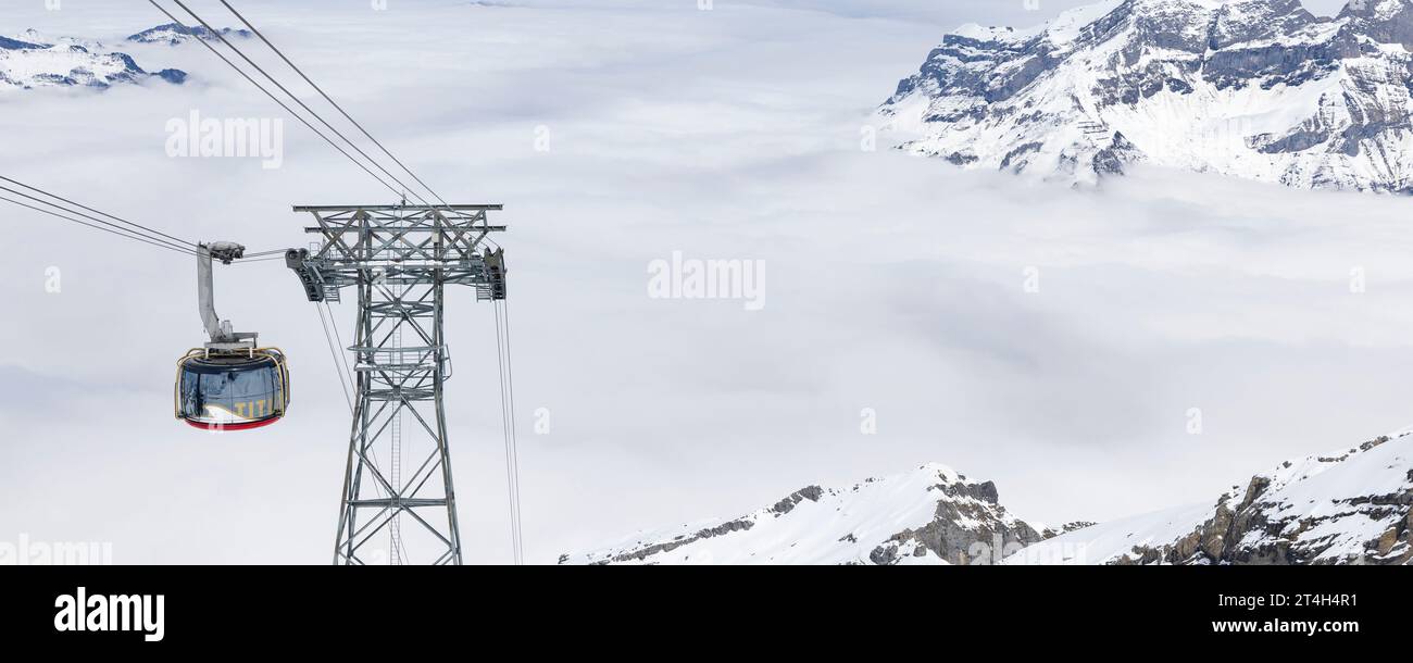 Cable car within snow landscape Mount Titlis at 3020 meters altitude in ...