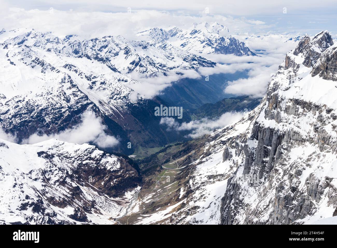Snow landscape with valley view from Mount Titlis at 3020 meters ...