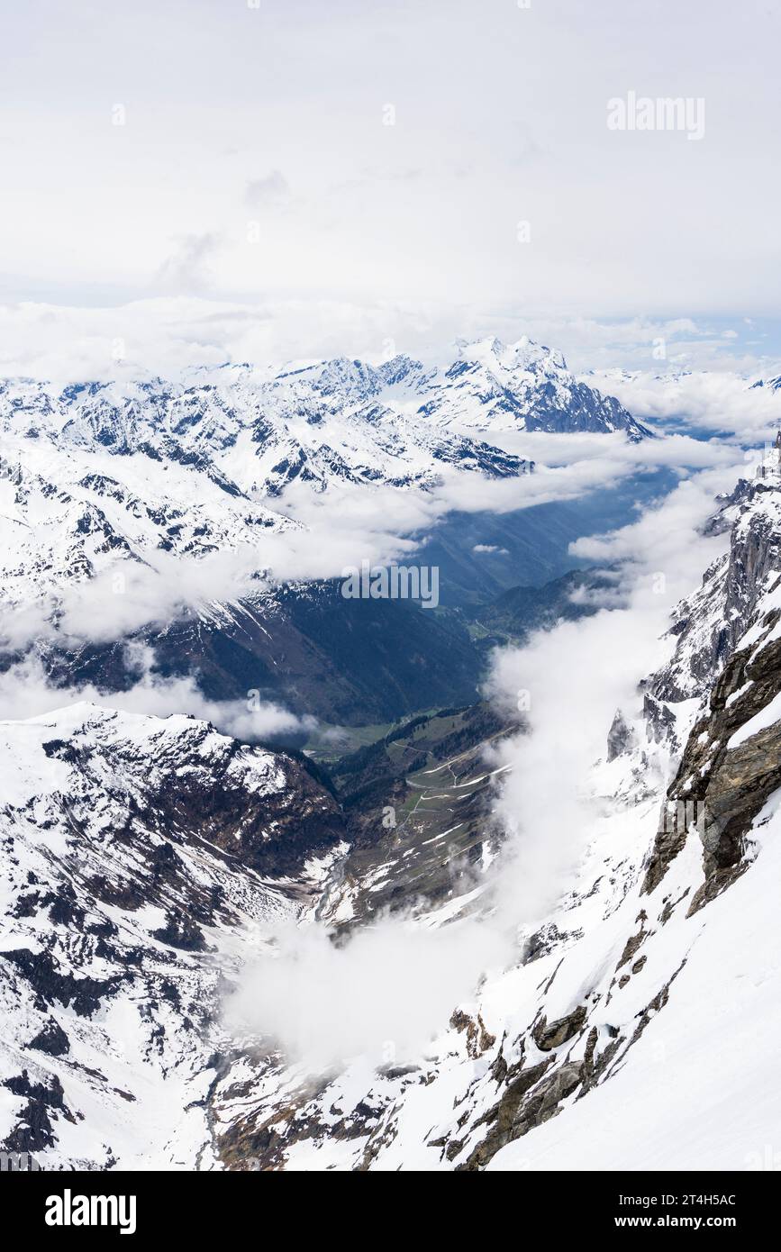 Snow landscape with valley view from Mount Titlis at 3020 meters ...