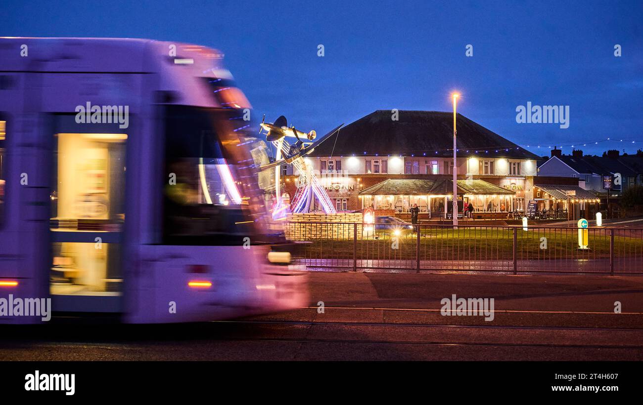 Tram passing the Spitfire feature at Gynn Square,Blackpool Stock Photo ...