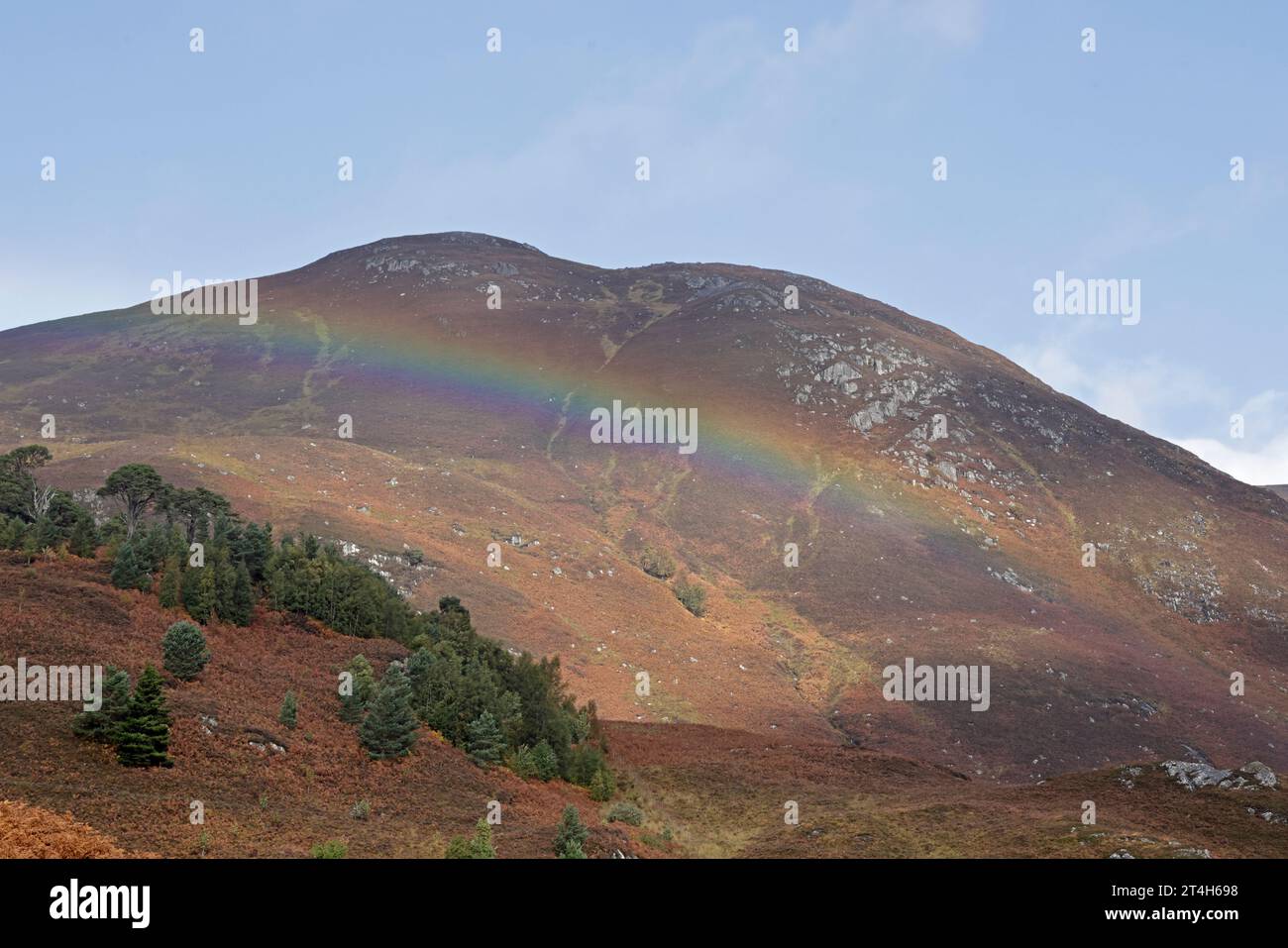 Rainbow over the hills in Glen Cannich in the Highlands Scotland UK ...