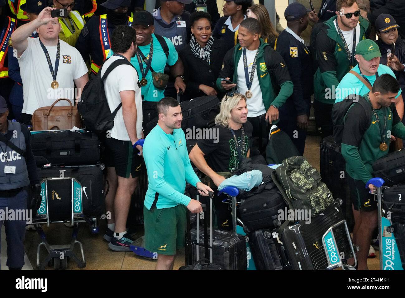 South Africa' Springbok scrum half Faf de Klerk, center, arrives with ...