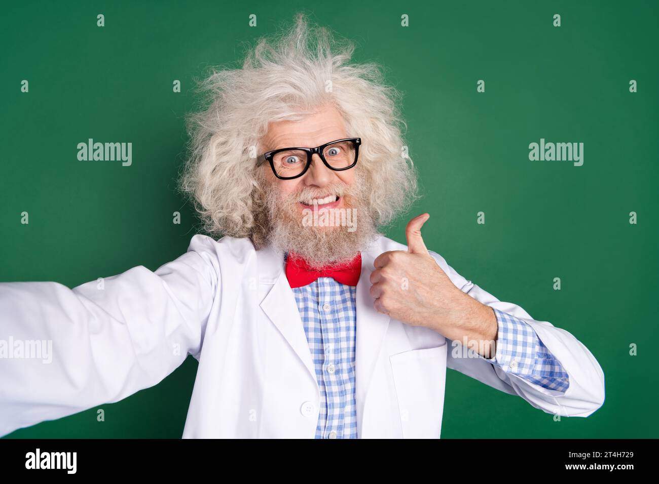 Photo of genius mature inventor dressed white uniform bow tie glasses ...