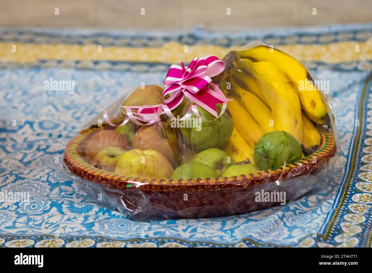 fruit gift wrap filled with different fruits from different angle Stock ...