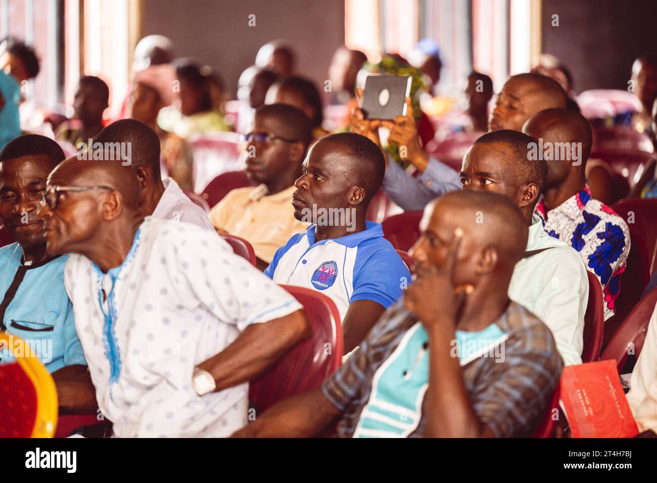 A large congregation gathered in a church in Abidjan, Cote d'Ivoire ...