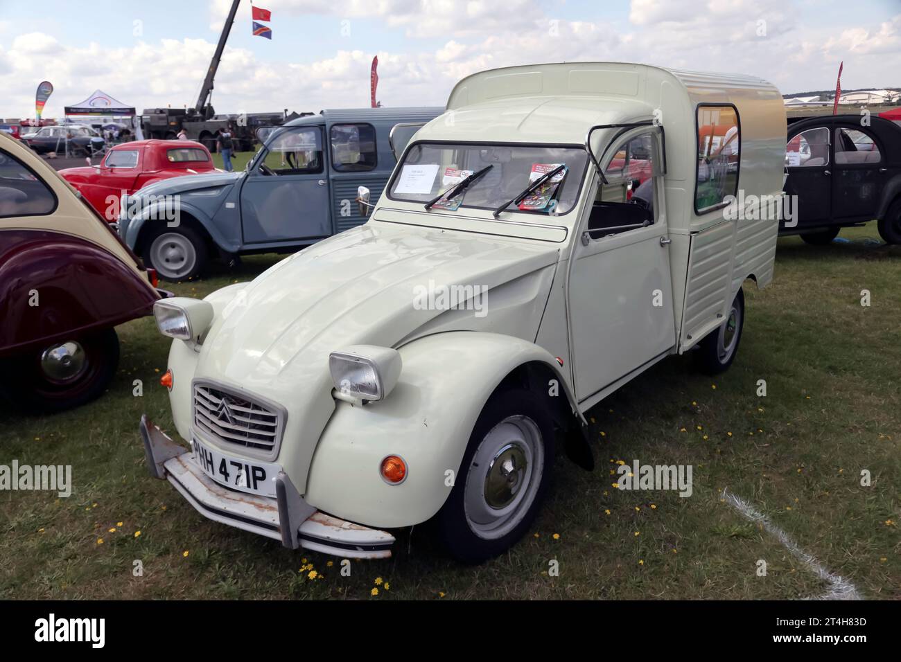 Three-quarter front view of a Cream, 1976, Citroen 2CV 400 Van, on ...