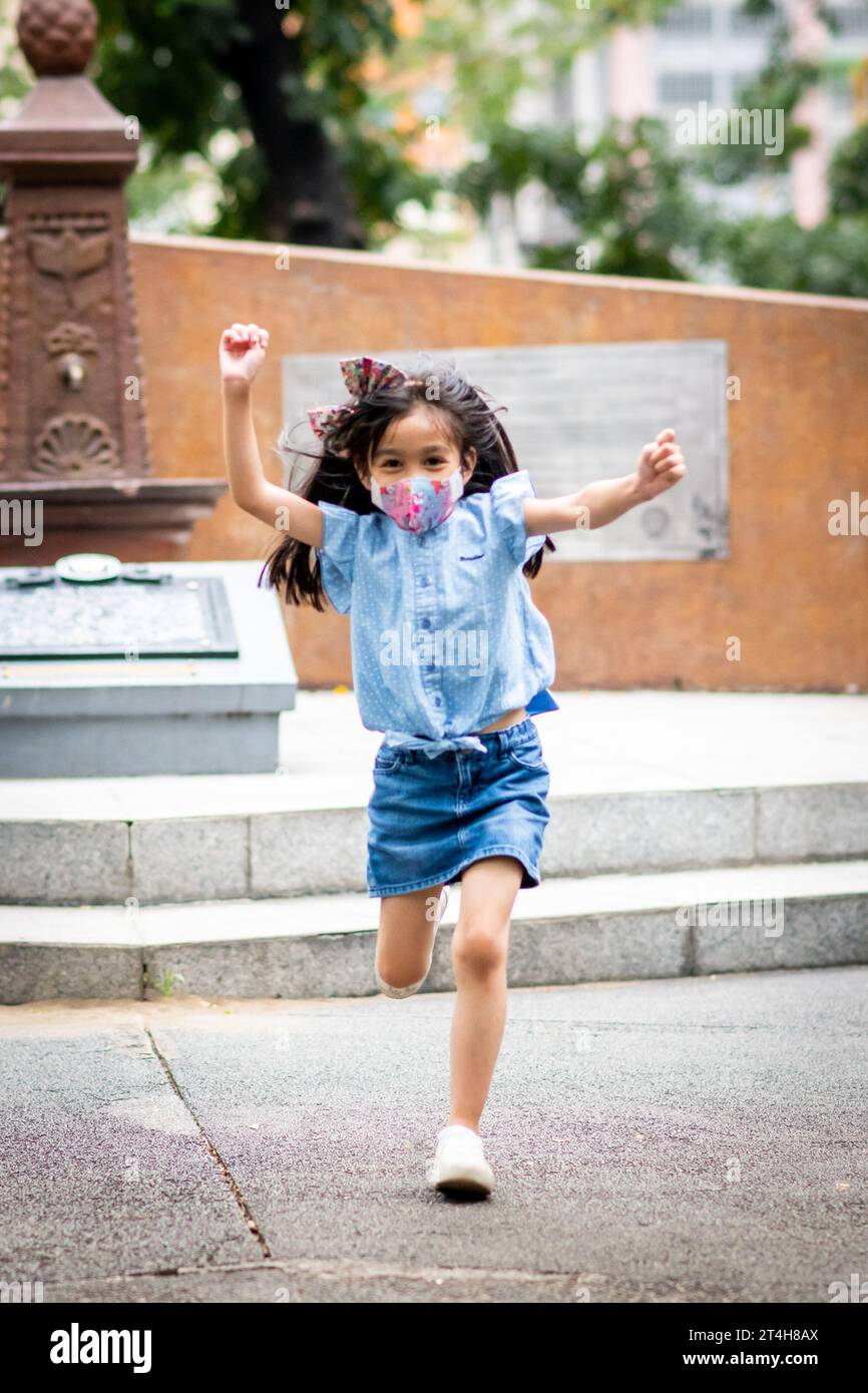 Children at play around a statue in Rizal Park, Ermita, Manila, The ...