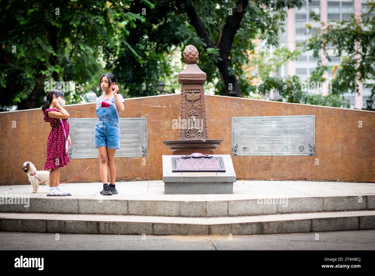 Children at play around a statue in Rizal Park, Ermita, Manila, The ...