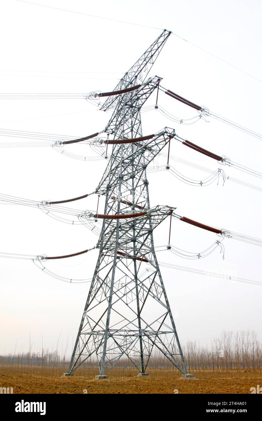 Electrical towers and power lines, closeup of photo Stock Photo - Alamy