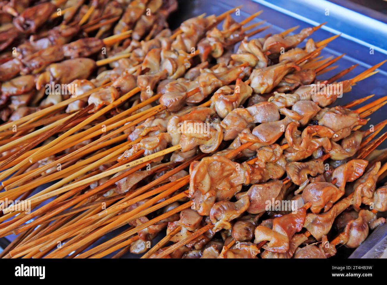 Grilled Chicken gizzard in a restaurant, closeup of photo Stock Photo ...