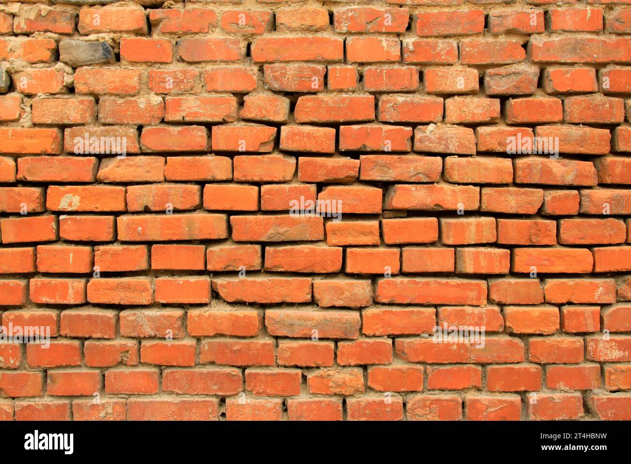 debris red brick wall, closeup of photo Stock Photo - Alamy