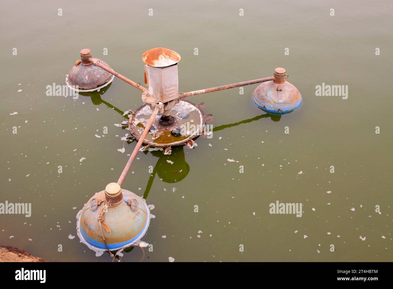 old aerator in the pond, closeup of photo Stock Photo - Alamy