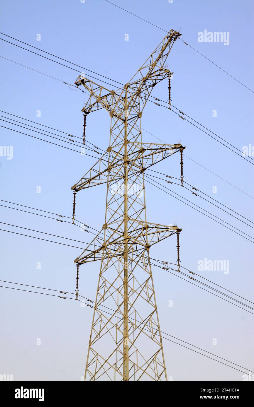 Electric power tower under the blue sky, closeup of photo Stock Photo ...
