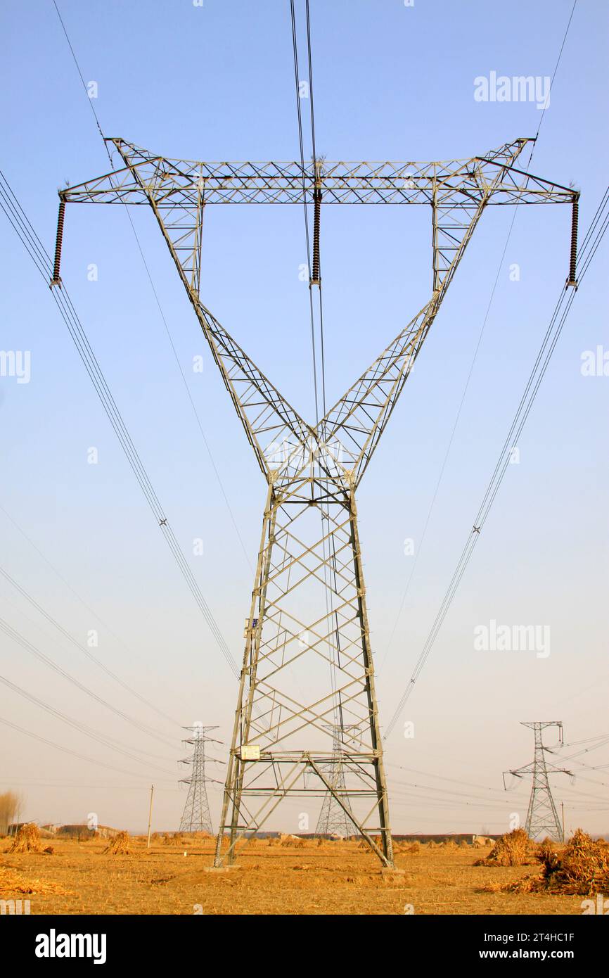 Electric power tower under the blue sky, closeup of photo Stock Photo ...