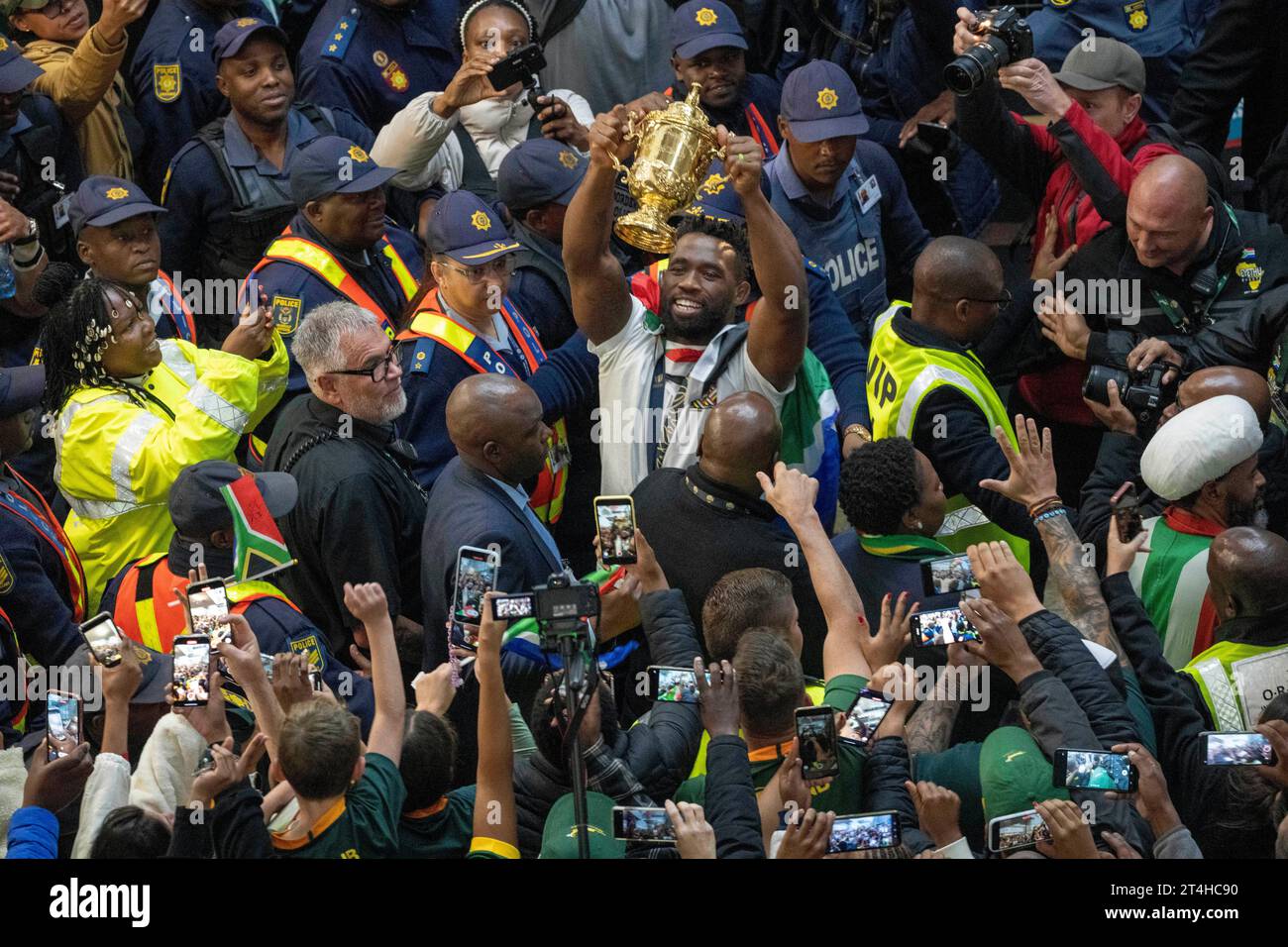 South Africa' Springbok captain Siya Kolisi, holds the Webb Ellis cup ...