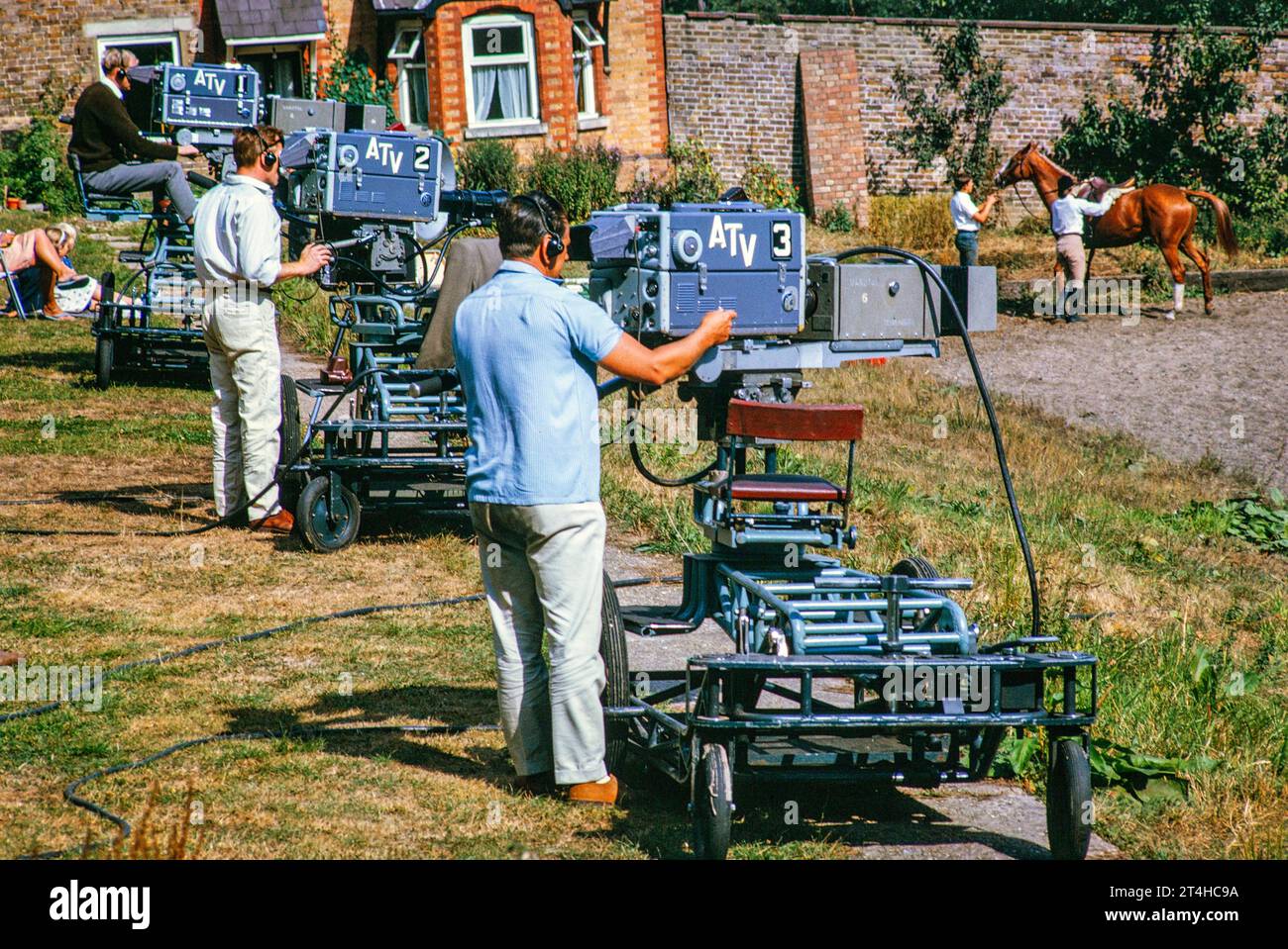 Cameramen operating cameras ATV television ITV company outside ...