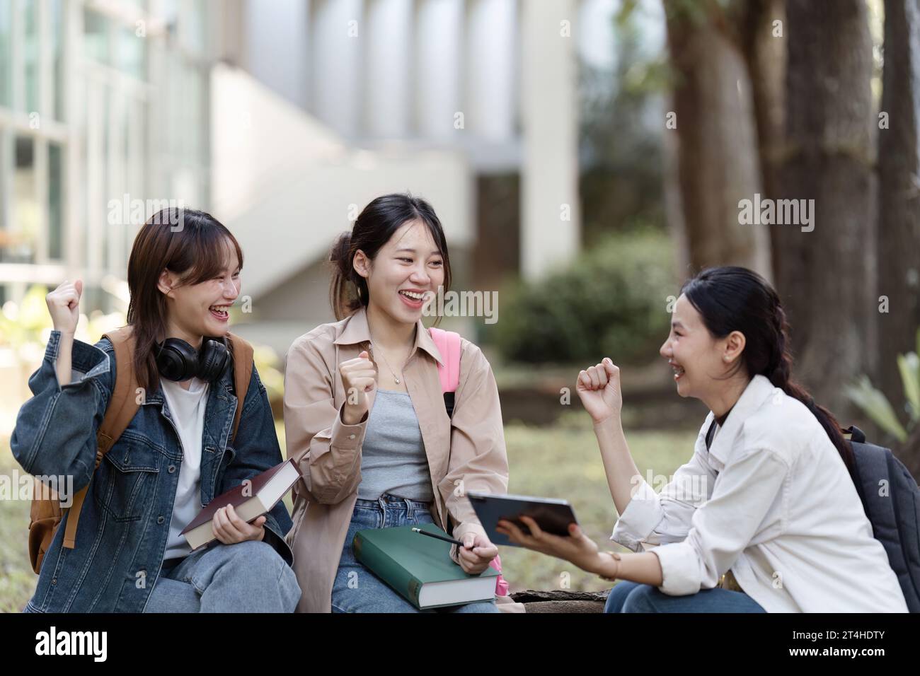 Group of Asian college student happy and celebrate after exam success ...