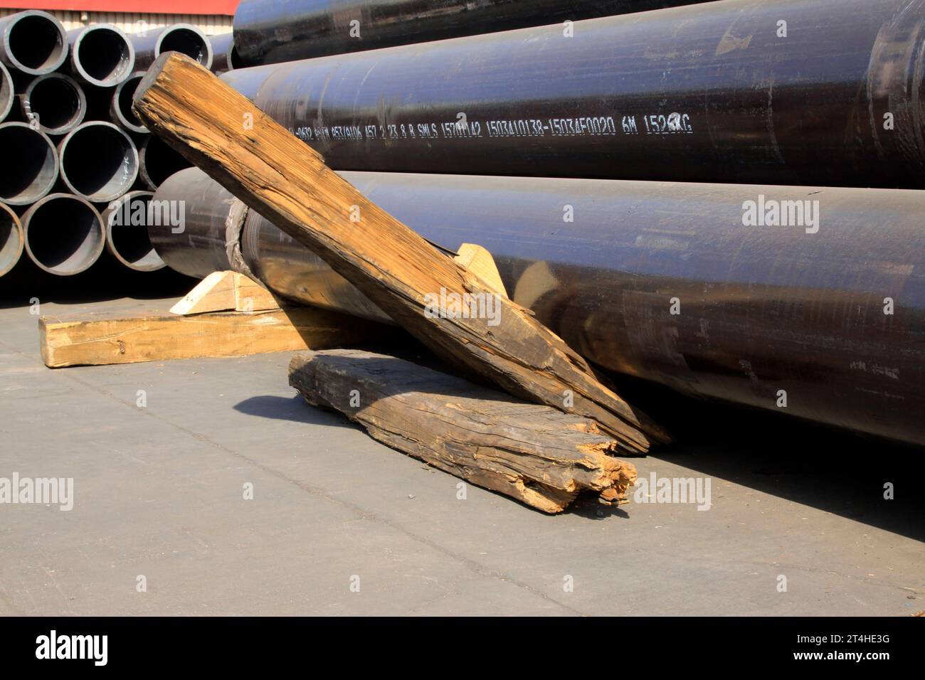 Steel pipe and crowbar on shipping dock, closeup of photo Stock Photo ...