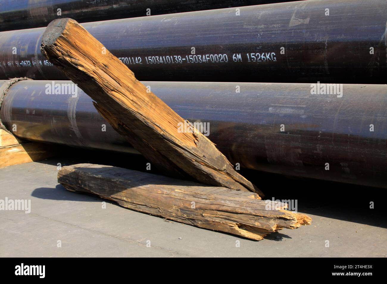 Steel pipe and crowbar on shipping dock, closeup of photo Stock Photo ...