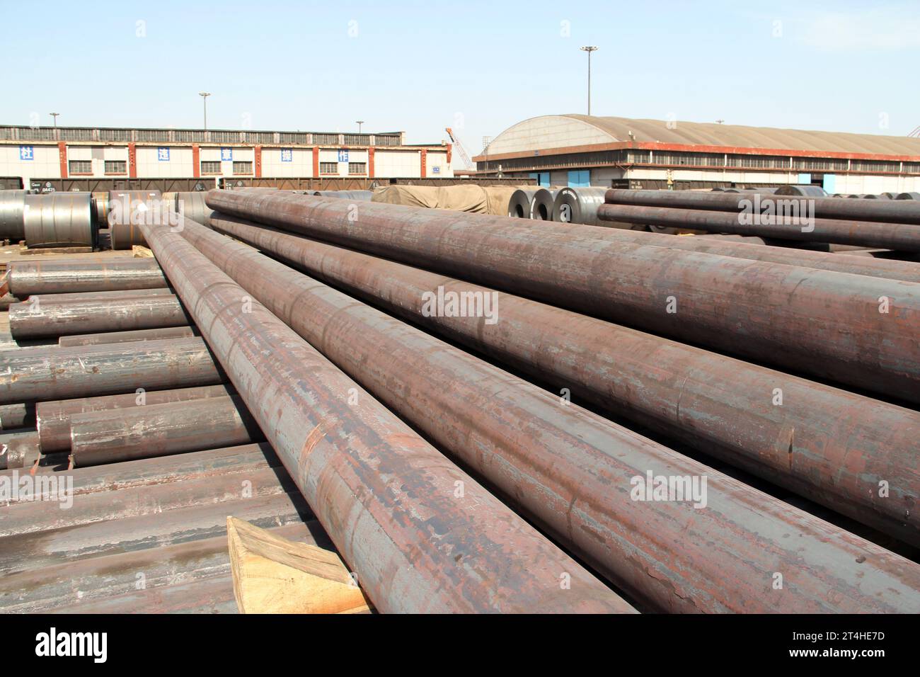 Steel pipe and warehouse, closeup of photo Stock Photo - Alamy