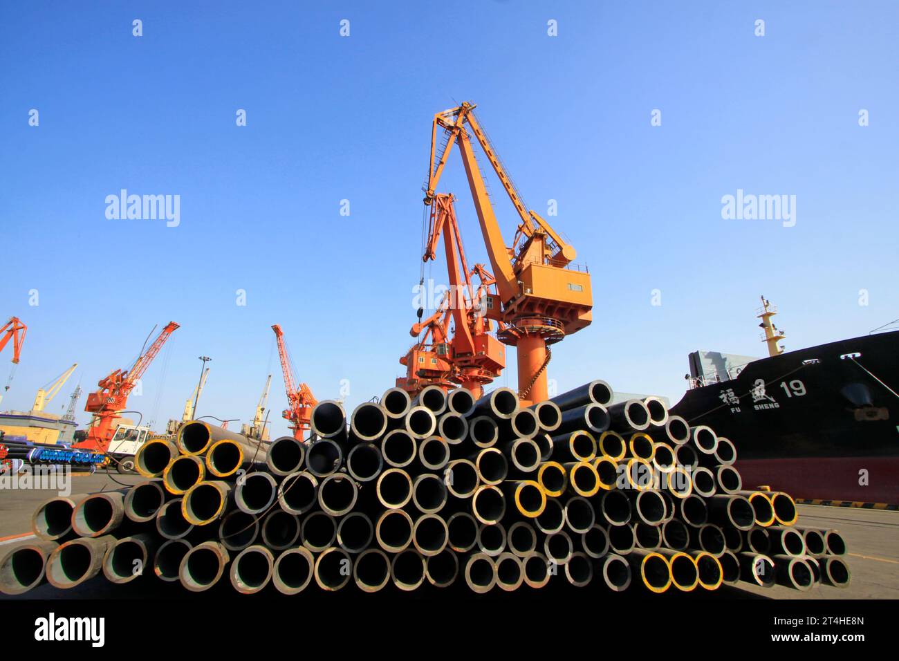 portal crane and steel pipe cross section features, closeup of photo ...