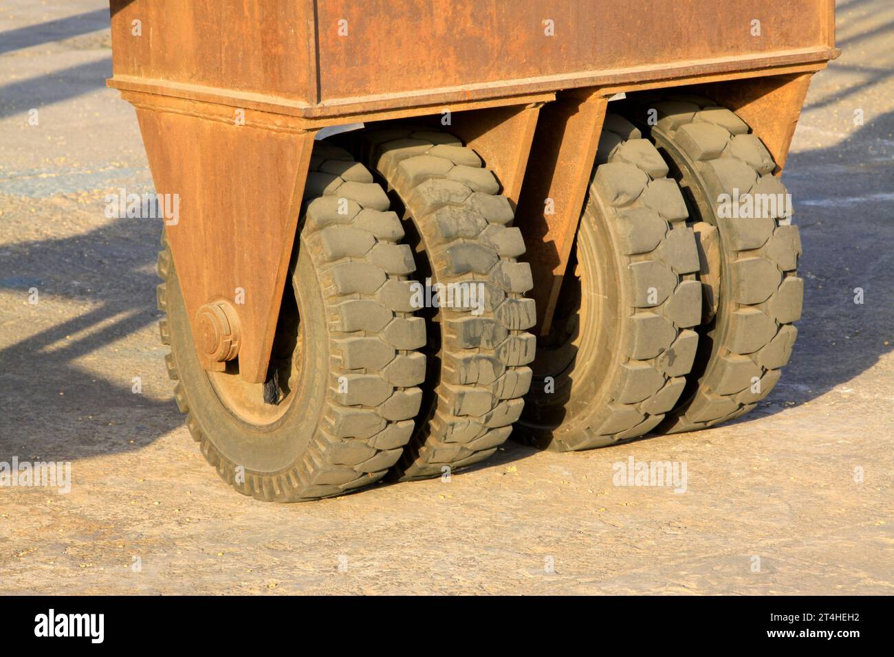 Steel parts and rubber tires, closeup of photo Stock Photo - Alamy
