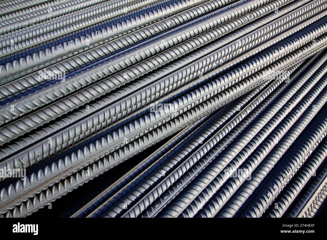deformed steel bar piled up together, closeup of photo Stock Photo - Alamy