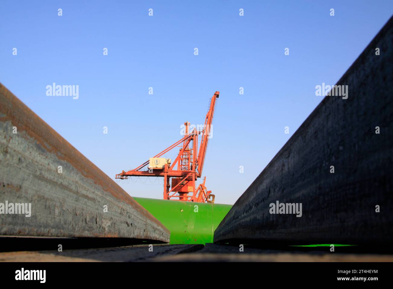 Portal crane and steel ingot, closeup of photo Stock Photo - Alamy Portal crane and steel ingot, closeup of photo Stock Photo - Alamy