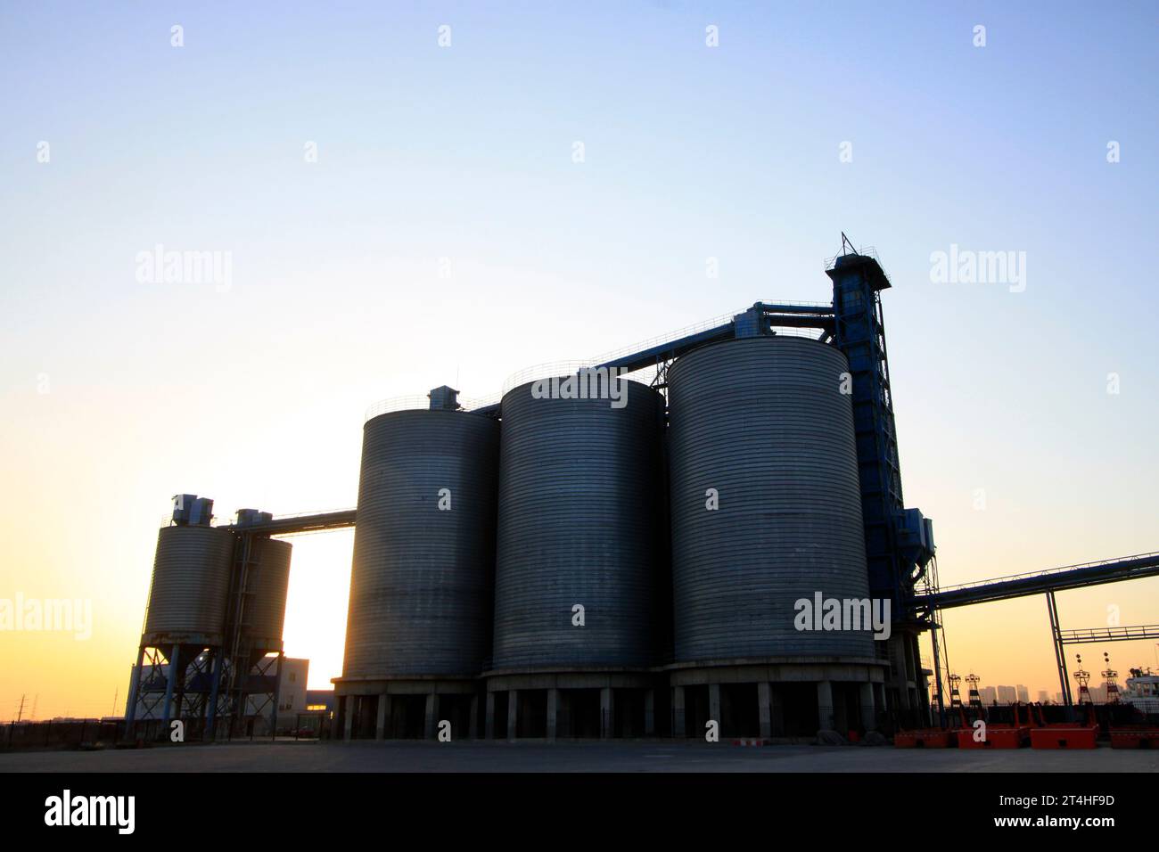 metal Tubular warehouse in bulk cargo terminal, closeup of photo Stock ...