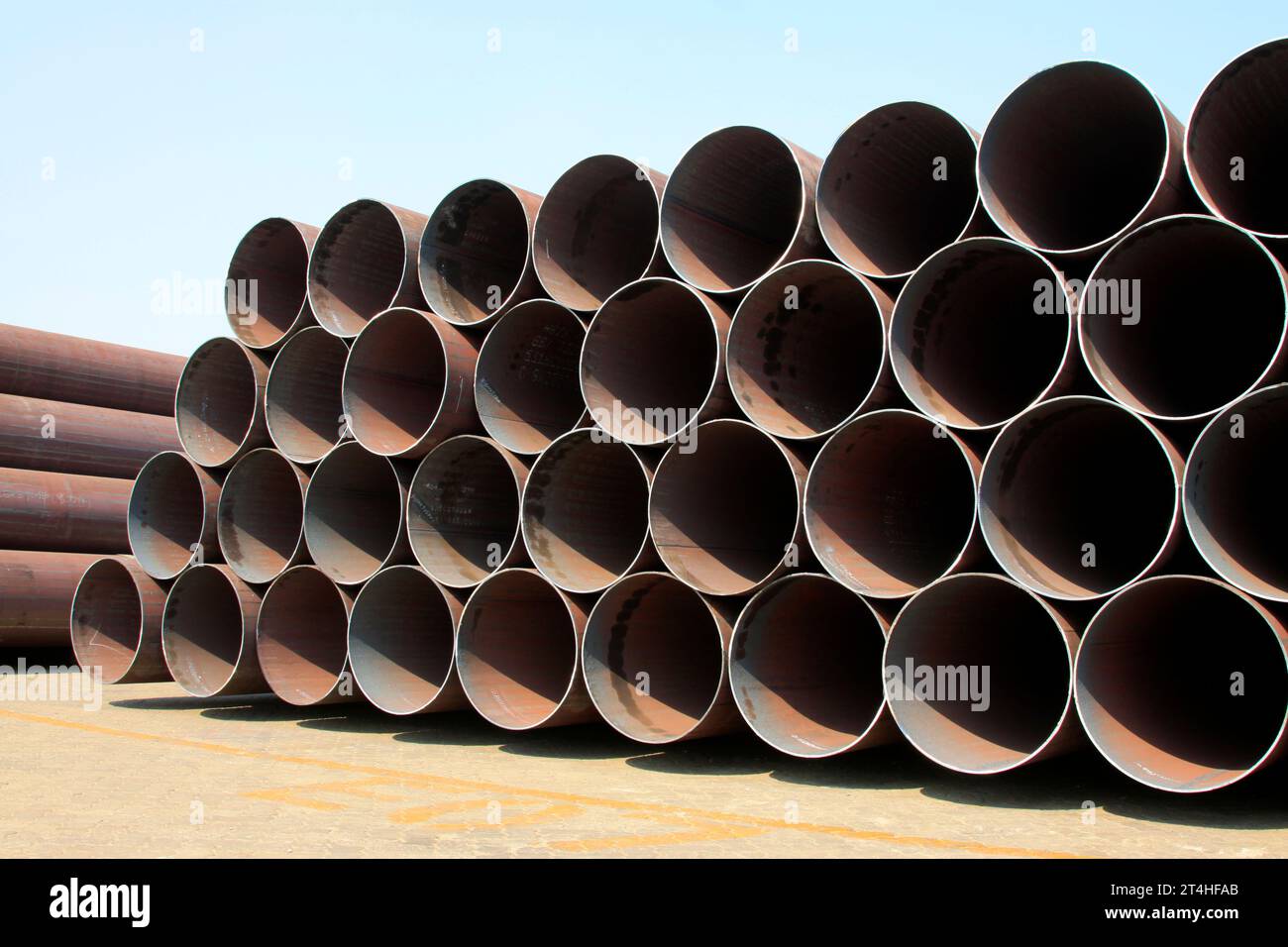 Piles of steel pipe, closeup of photo Stock Photo - Alamy