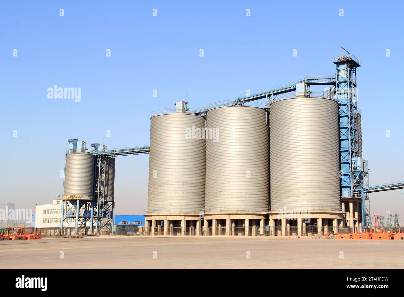 metal Tubular warehouse in bulk cargo terminal, closeup of photo Stock ...