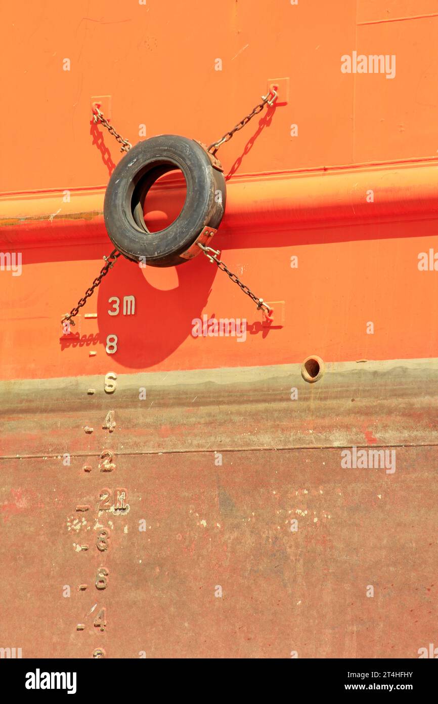 cargo ship's rail and tire, closeup of photo Stock Photo - Alamy