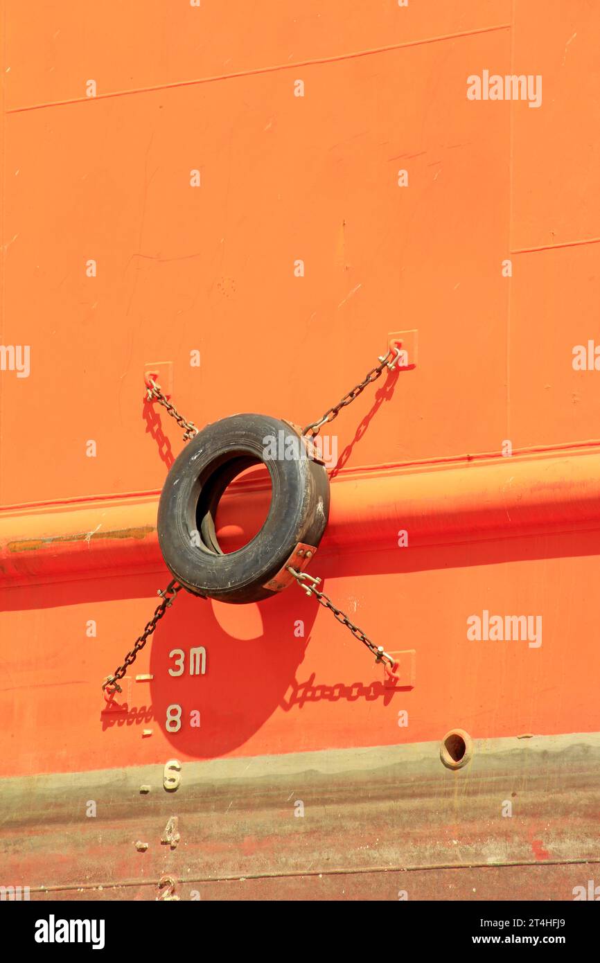 cargo ship's rail and tire, closeup of photo Stock Photo - Alamy