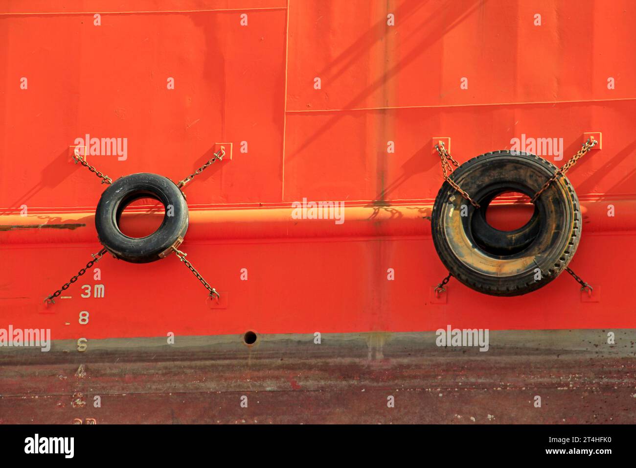 cargo ship's rail and tire, closeup of photo Stock Photo - Alamy