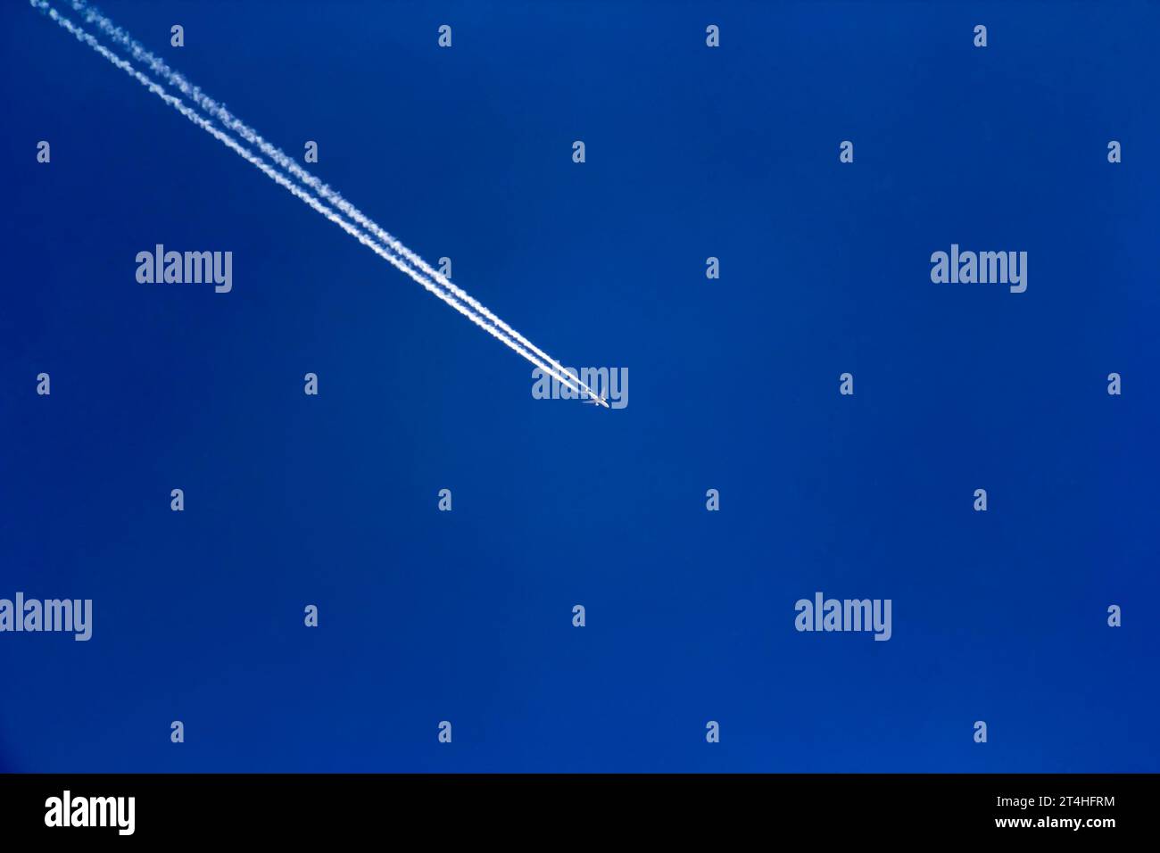 A jet plane in the sky, closeup of photo Stock Photo - Alamy