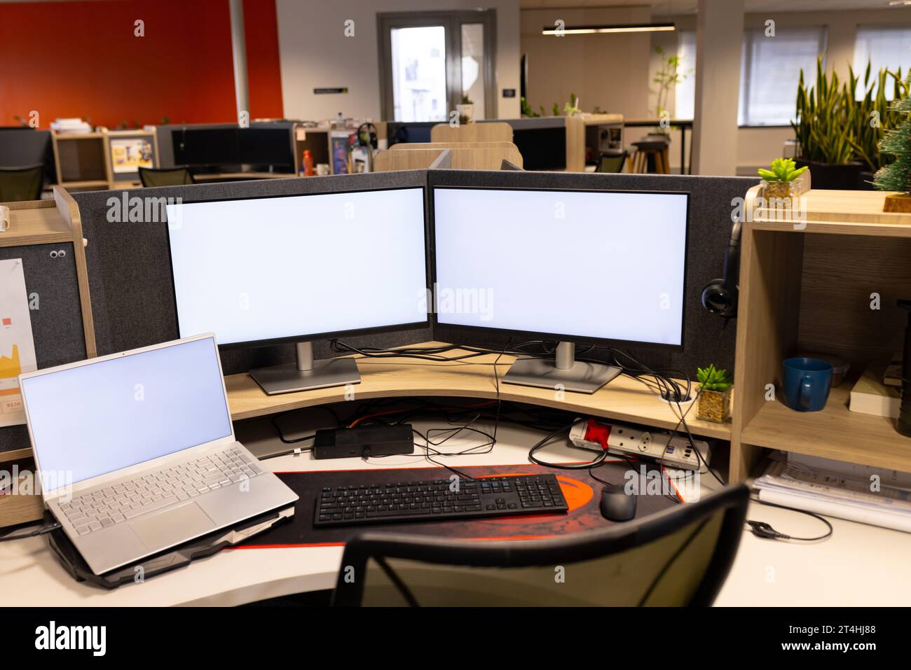 Interior of office cubicle with laptop and computer screens in office, copy space Stock Photo ...