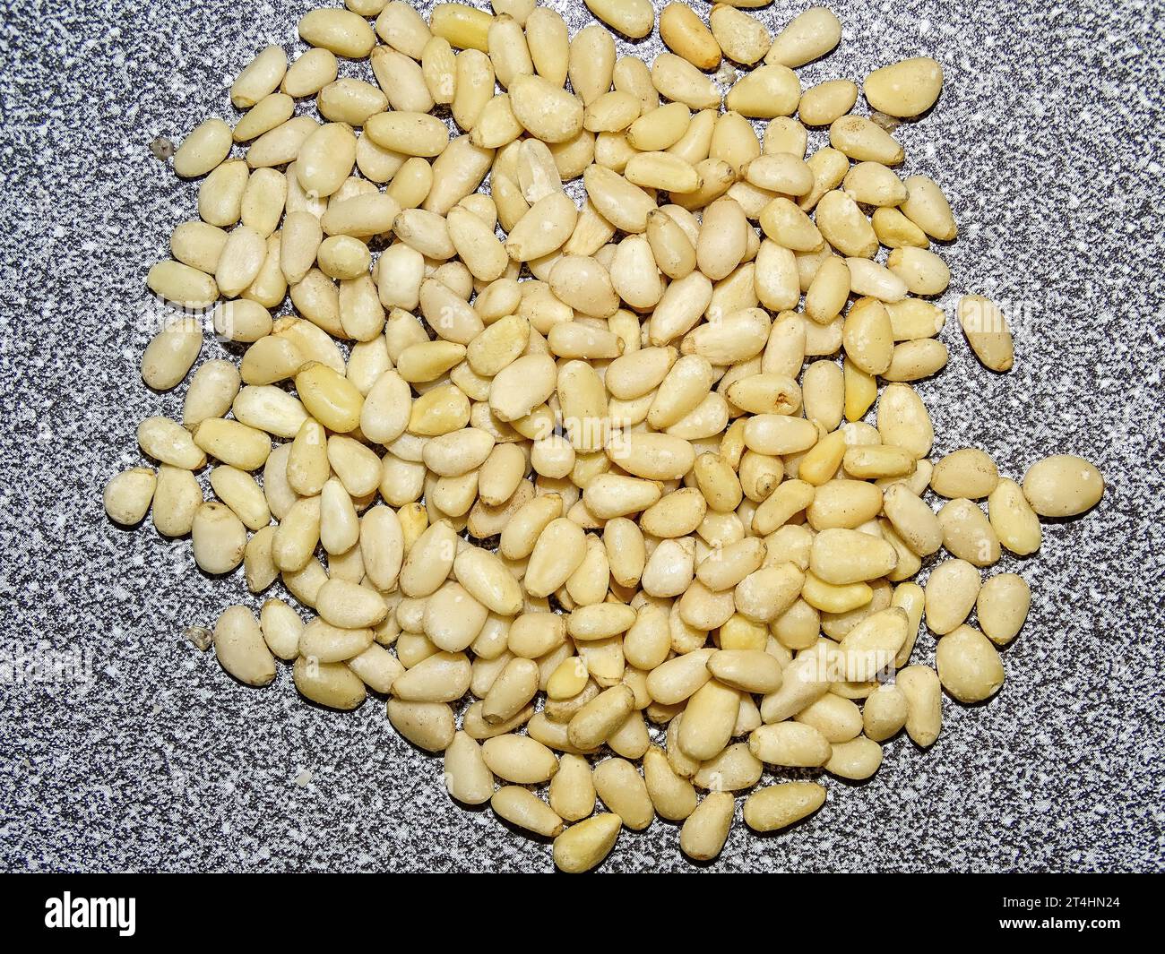 Pile of pine seeds. Pine seeds background Stock Photo - Alamy