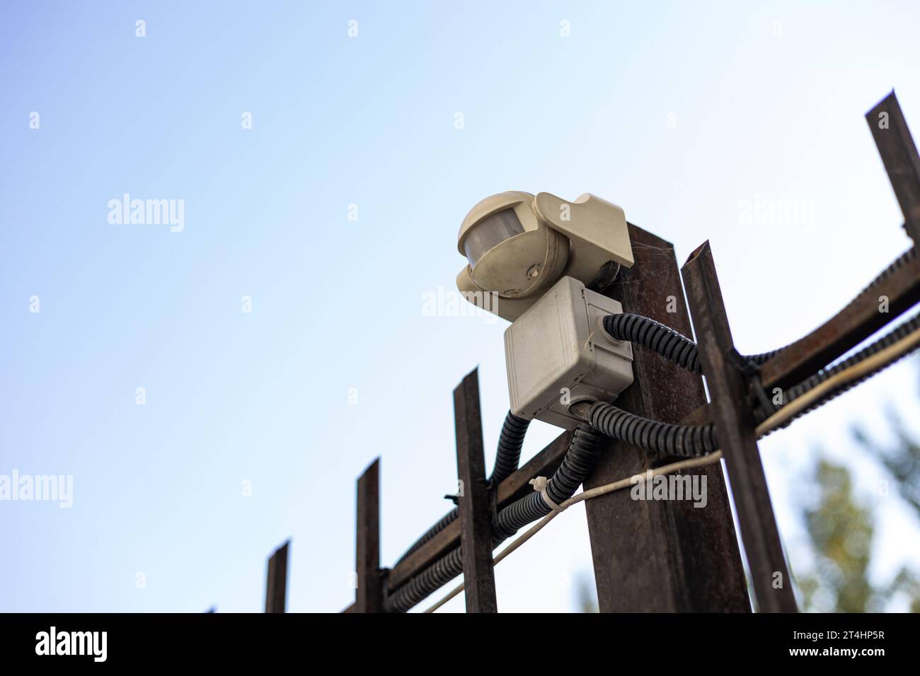 Small automatic street lamp connected to residential building ...