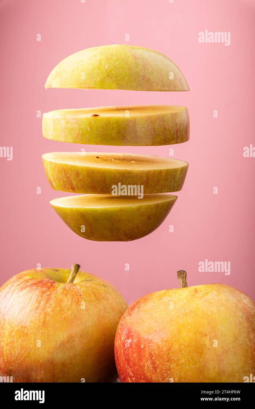 Flying apple sliced red apple hi-res stock photography and images - Alamy