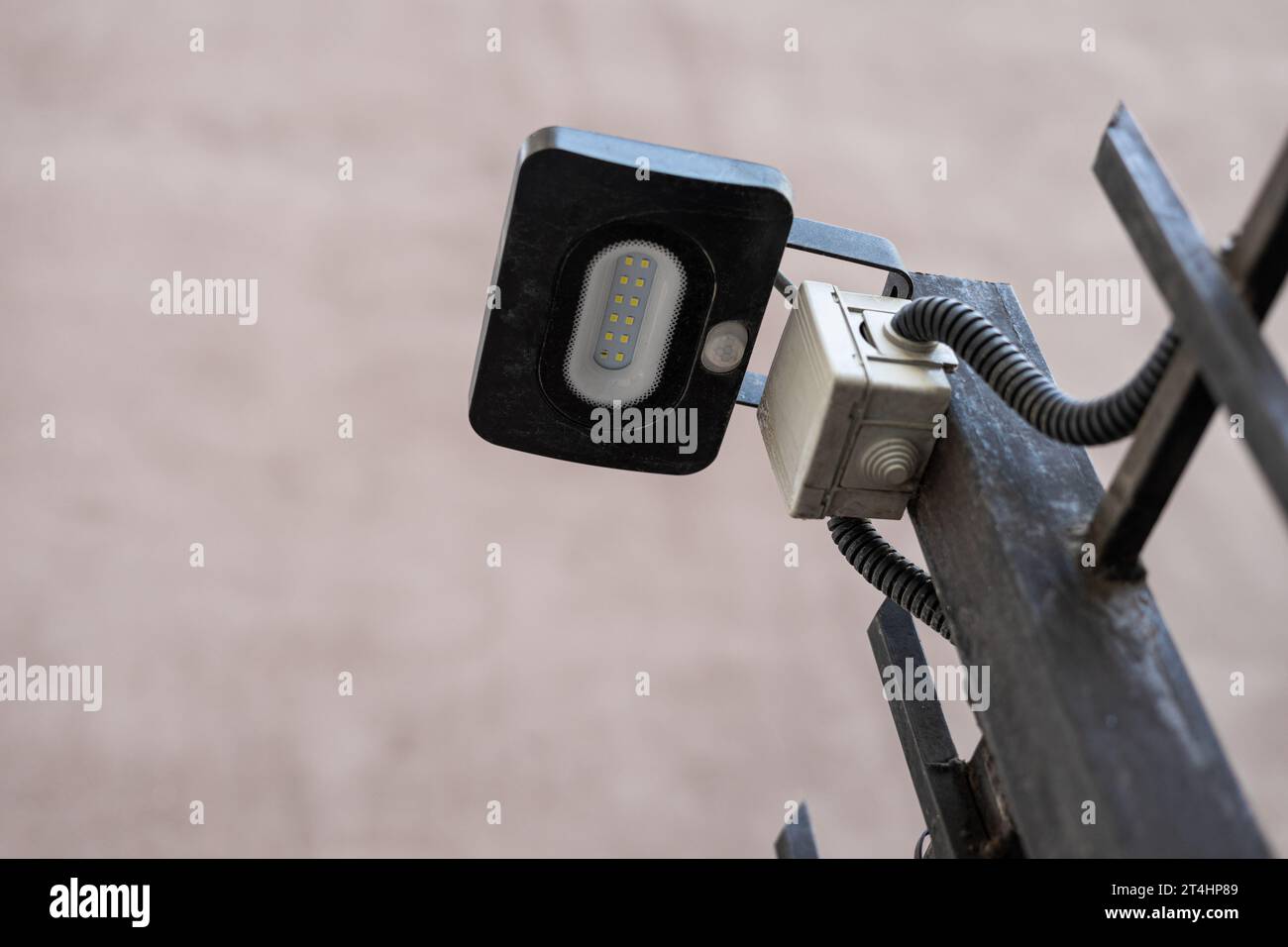 LED flashlight connected to residential building communications. Small ...