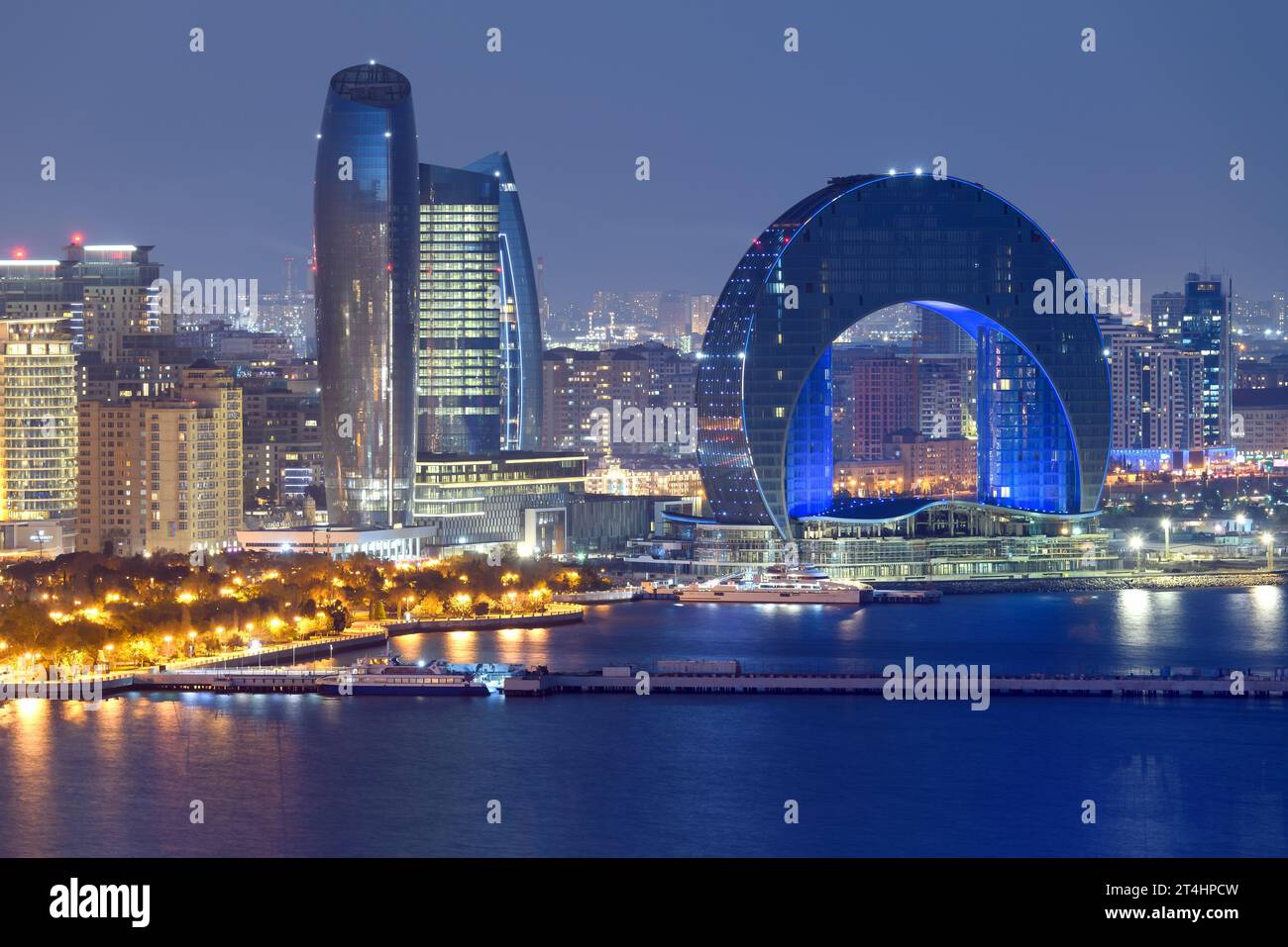 Modern skyline of Baku at night. Modern waterfront promenade of Baku ...
