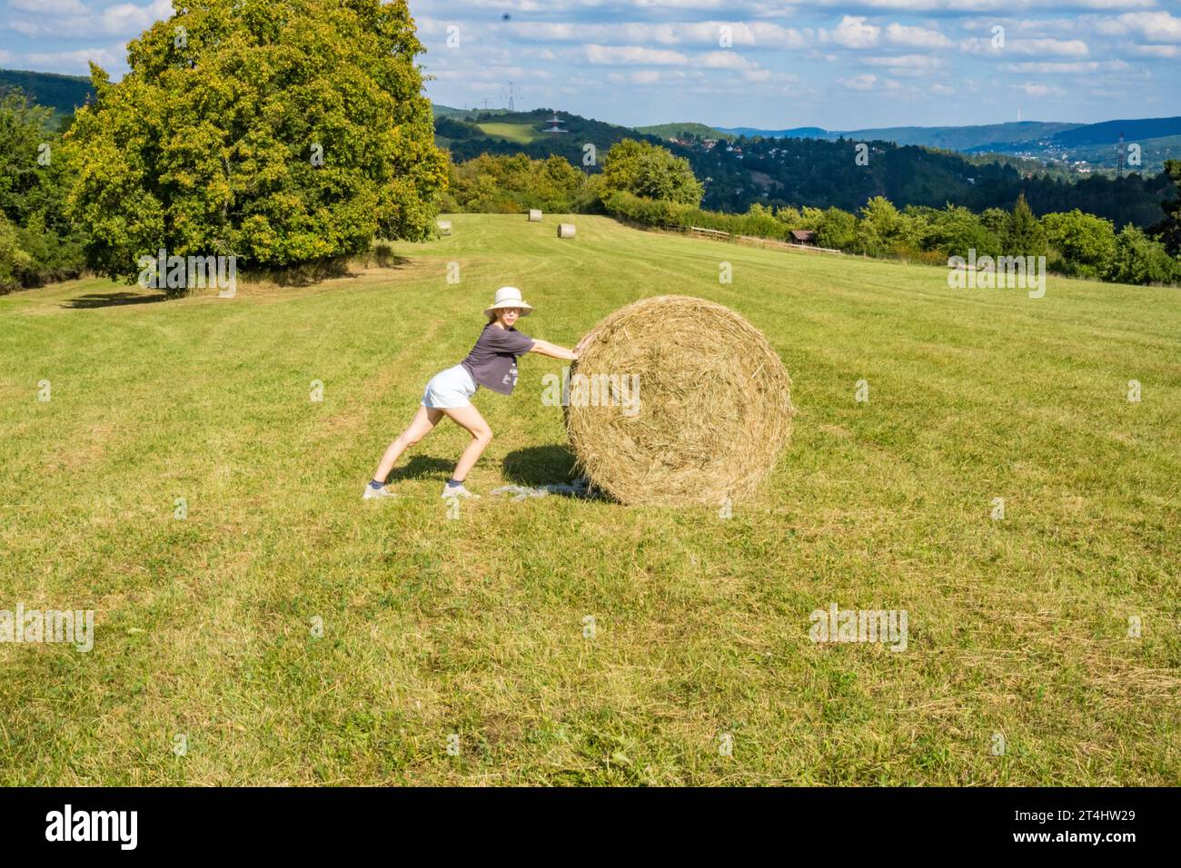 Farmer girl hay hi-res stock photography and images - Alamy