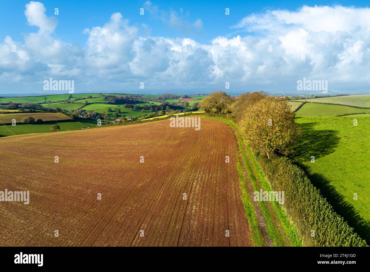 Lights and Shadows over Fields and Farms from a drone, Devon, England ...