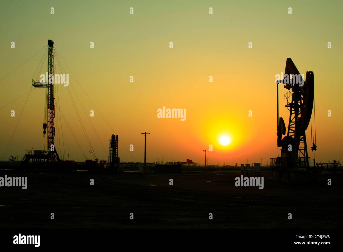 Crank balanced beam pumping unit in Jidong oilfield sunset scenery ...