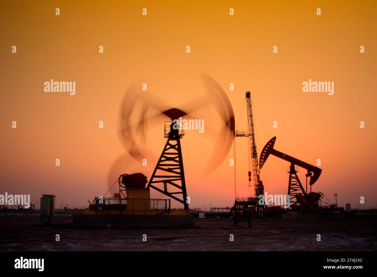 Crank balanced beam pumping unit in Jidong oilfield sunset scenery ...