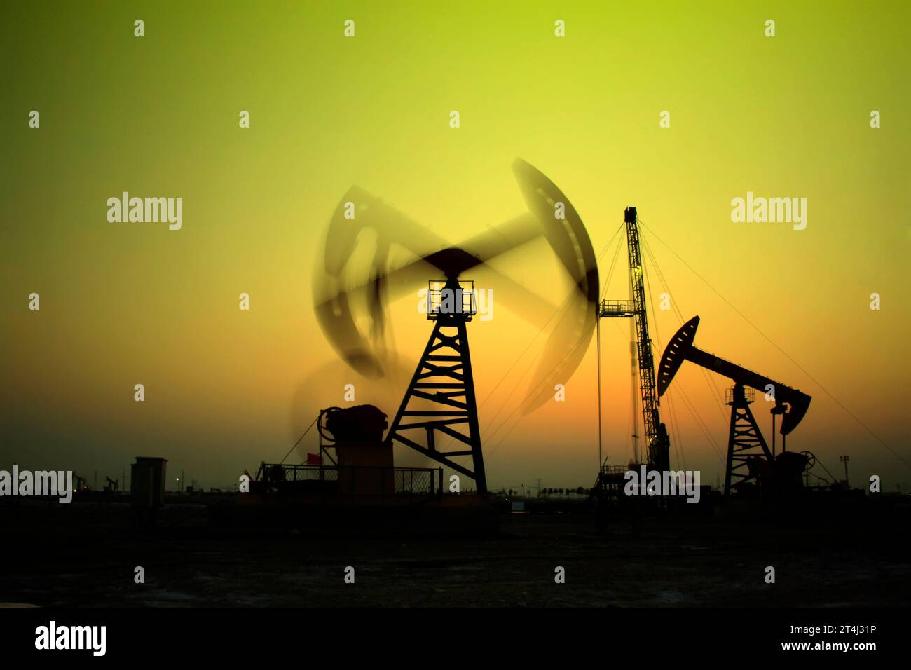 Crank balanced beam pumping unit in Jidong oilfield sunset scenery ...