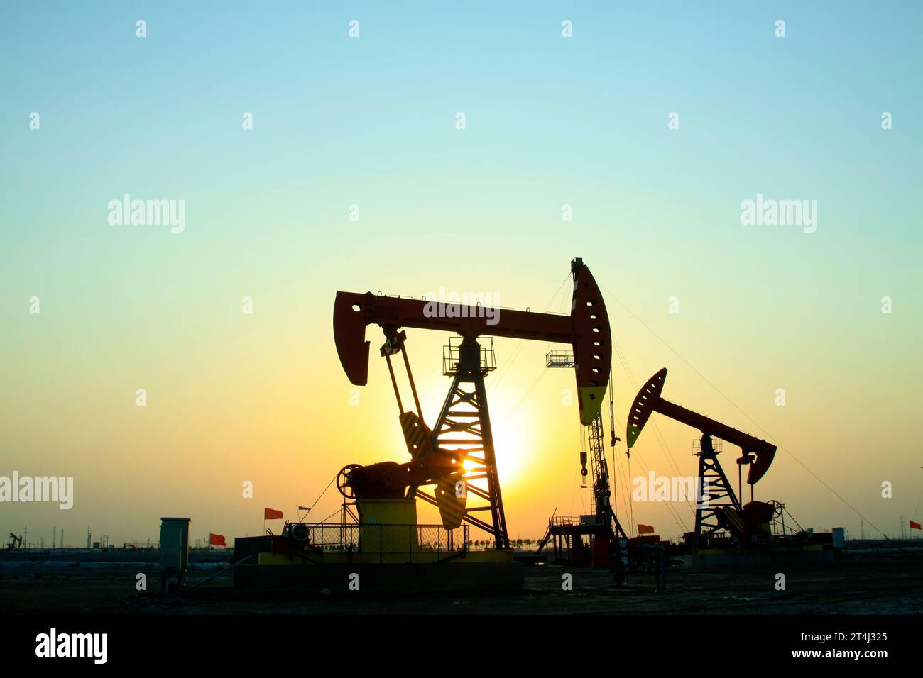 Crank balanced beam pumping unit in Jidong oilfield sunset scenery ...