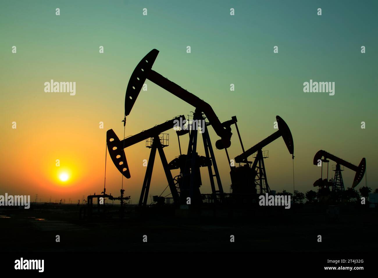 Crank balanced beam pumping unit in Jidong oilfield sunset scenery ...